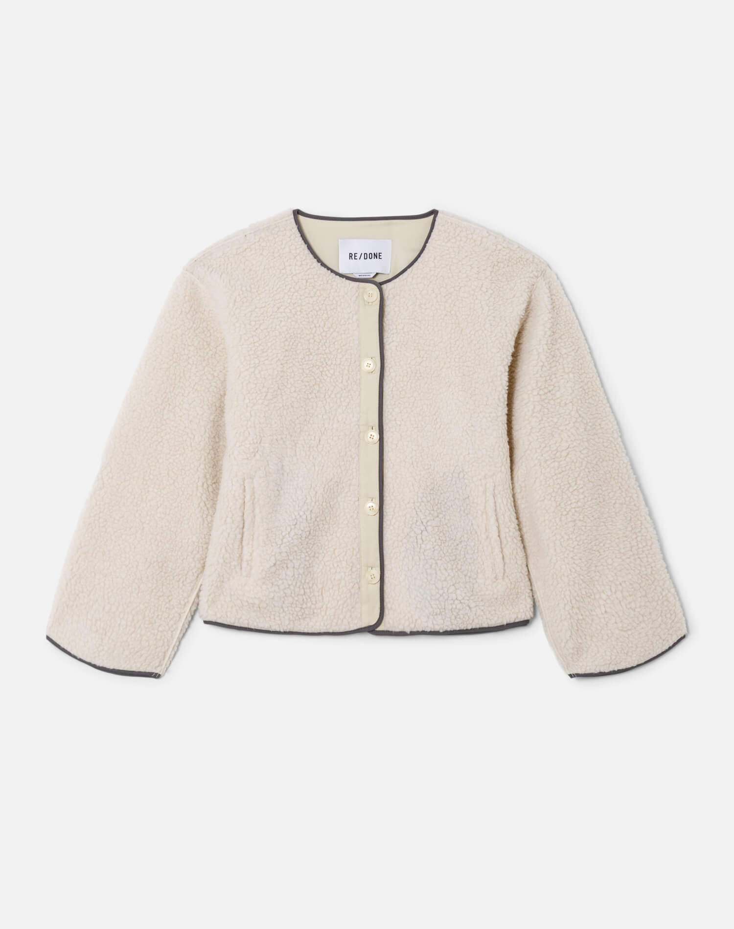 white collarless jacket